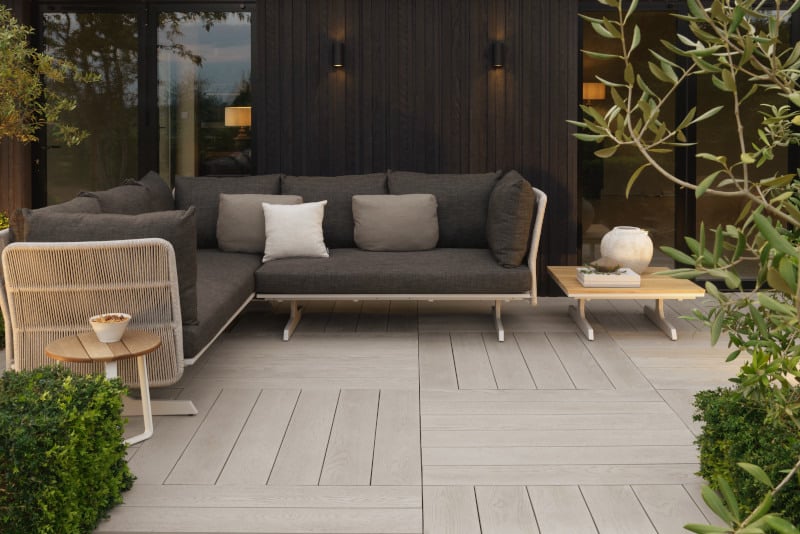 Choosing the Right Outdoor Surface: Deck vs Pavers