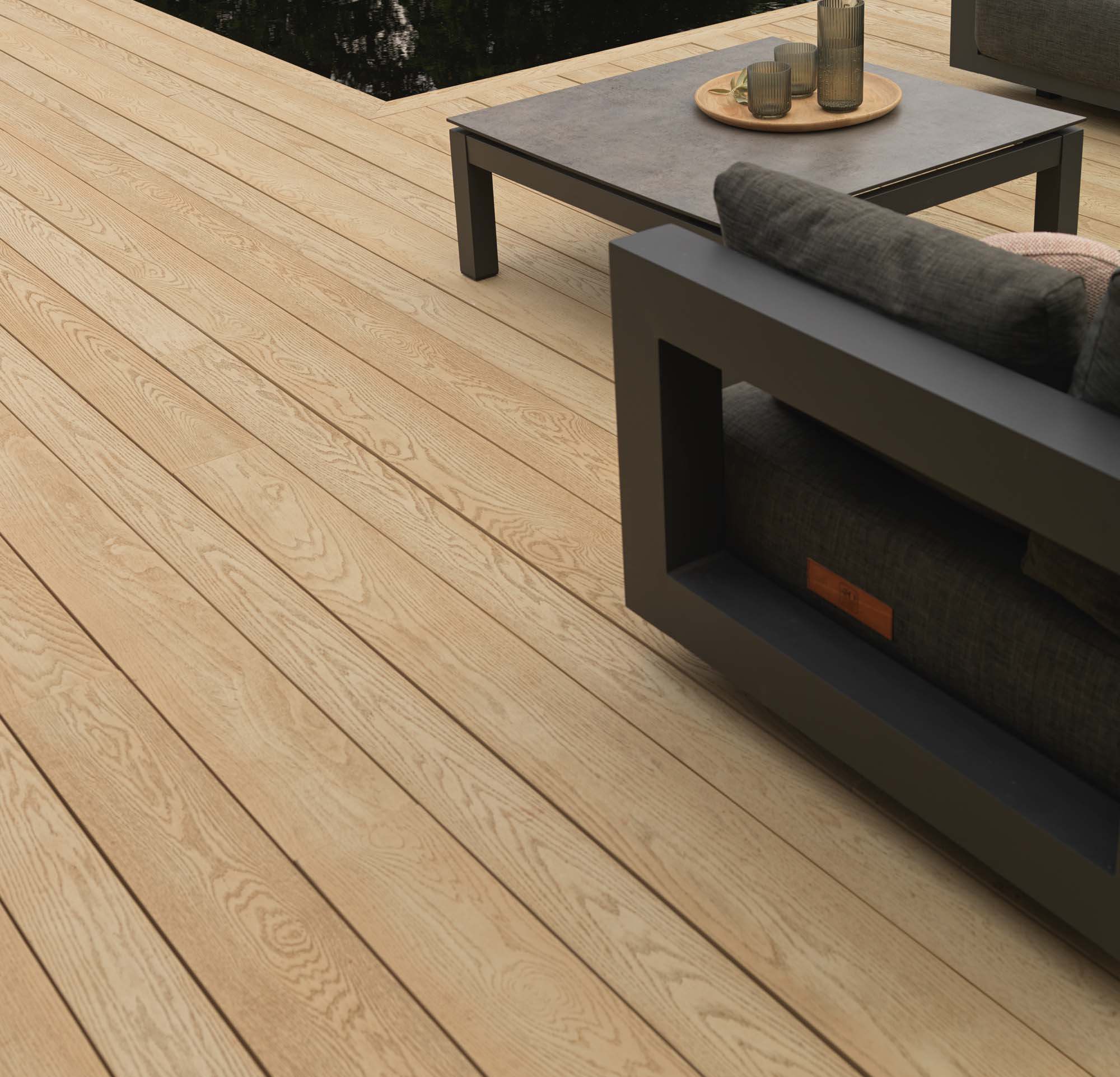 Choosing the Right Outdoor Surface: Deck vs Pavers
